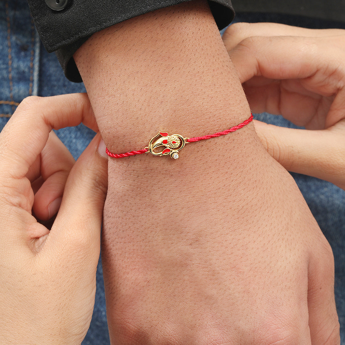 Auspicious Lord Ganesh Ji CZ Sterling Silver Thread Rakhi – Zavya